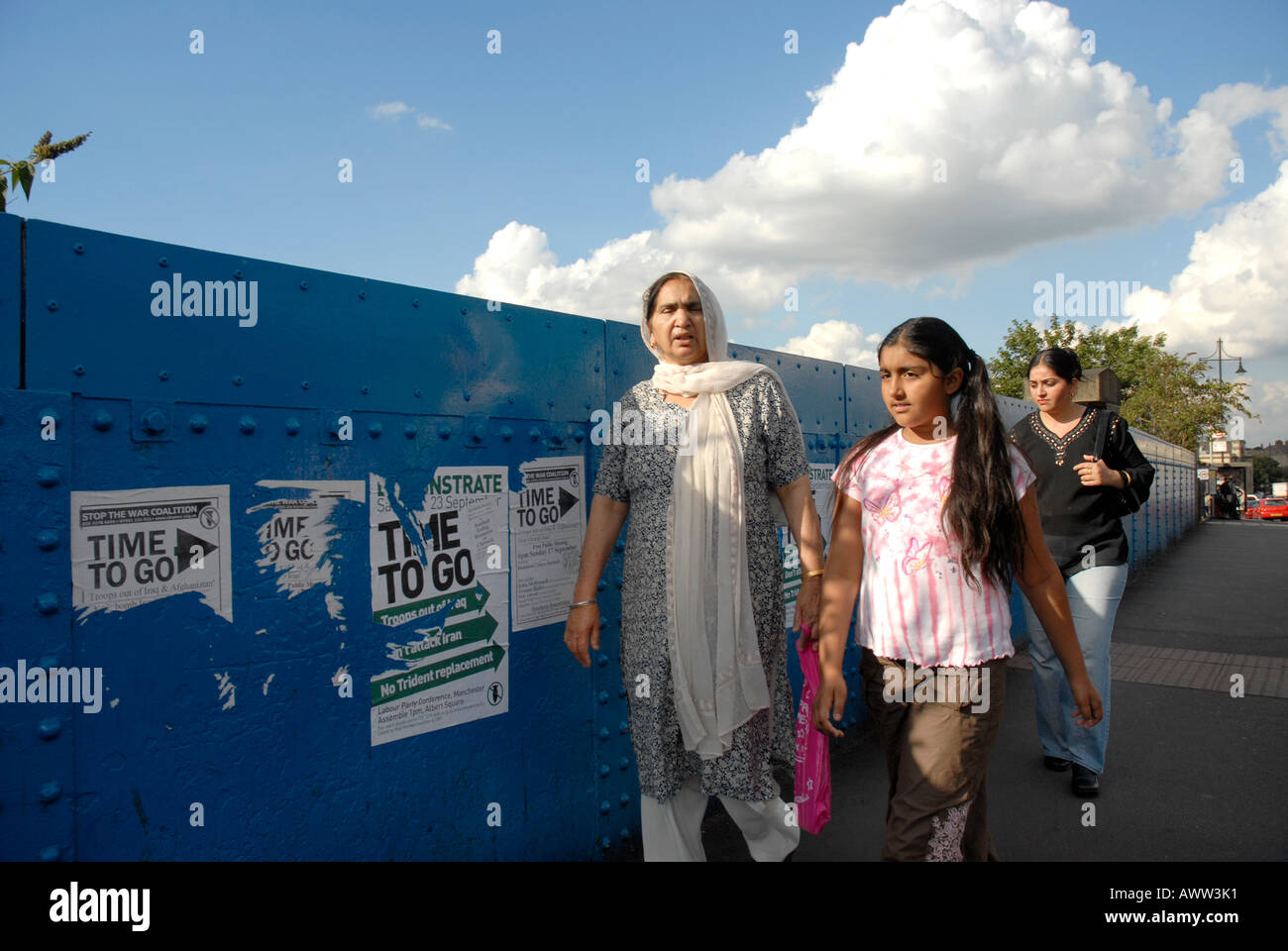 Street scene of people in Southall Middlesex Stock Photo - Alamy