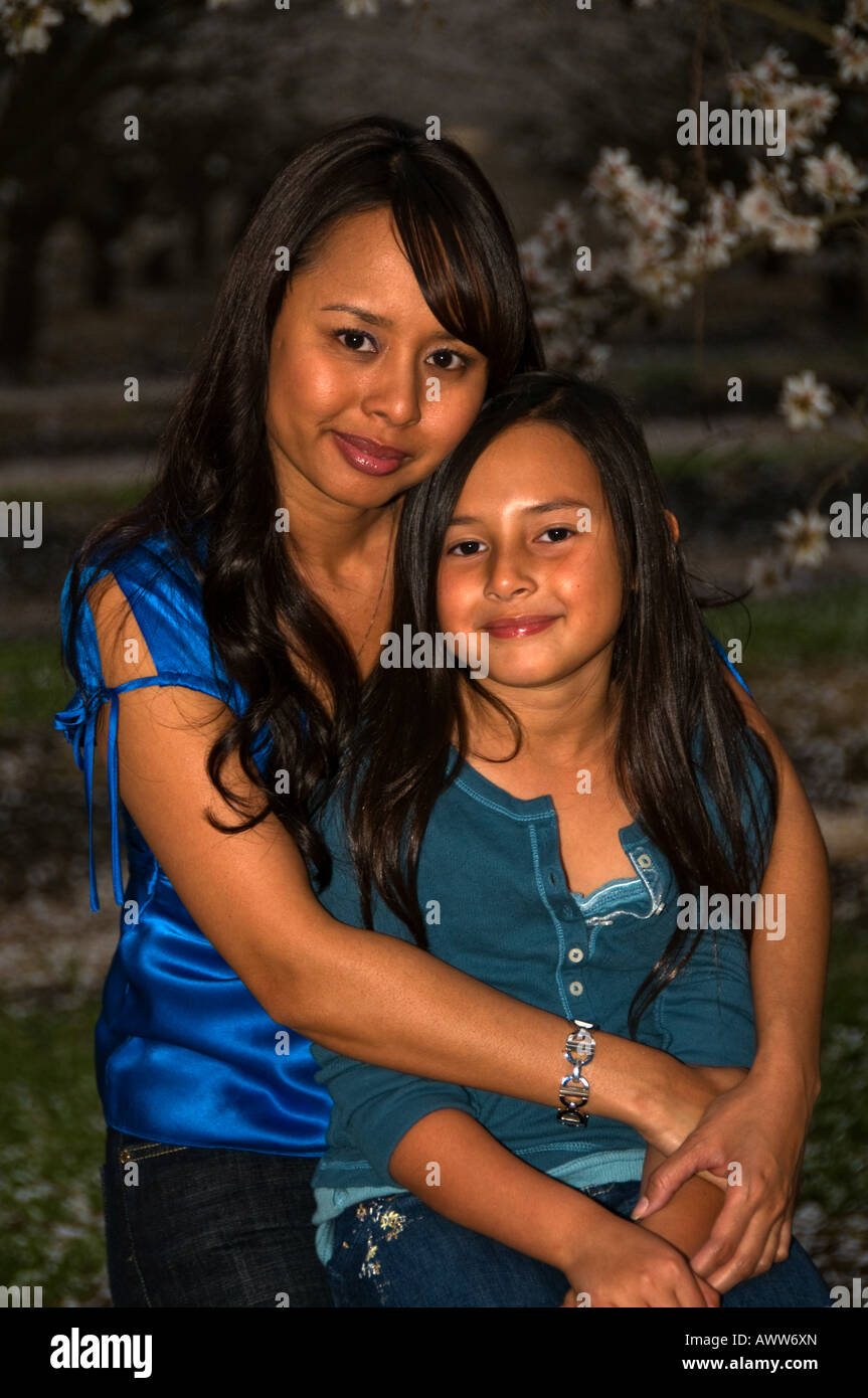 Mom Daughter Smiling Happy Posing Hugging Almond Orchard Vertical Stock ...