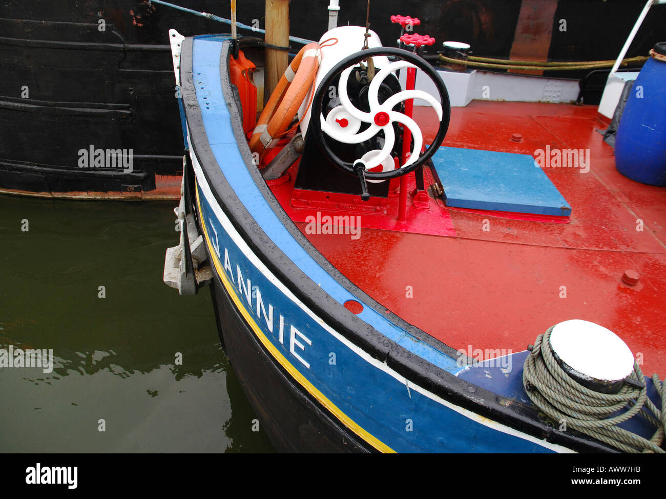 Bow windlass on a blue and red dutch Luxemotor barge, Holland ...