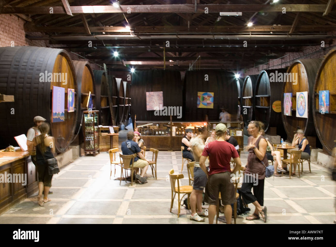 Group of people on tour of wine cellar Stock Photo - Alamy