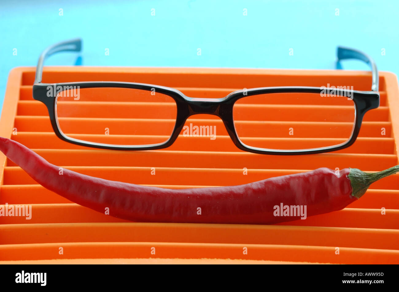 Glasses and red chilli Stock Photo - Alamy