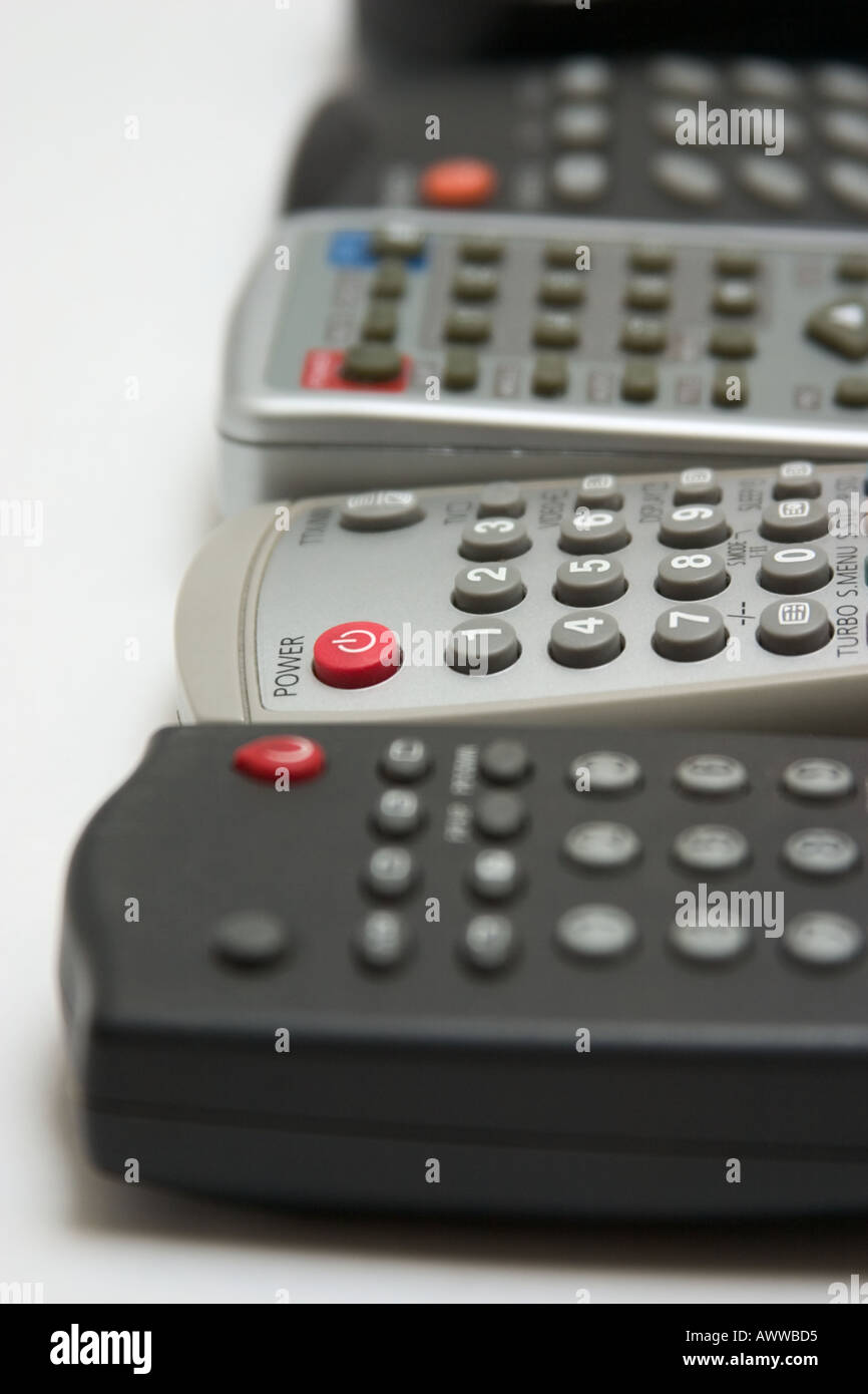 many remote controls for different appliances concept confusion Stock ...