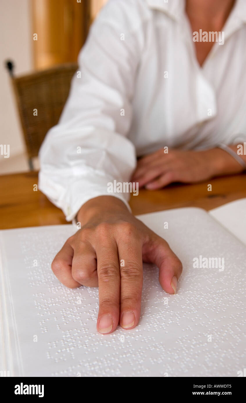 Handicapped woman reading book hi-res stock photography and images - Alamy