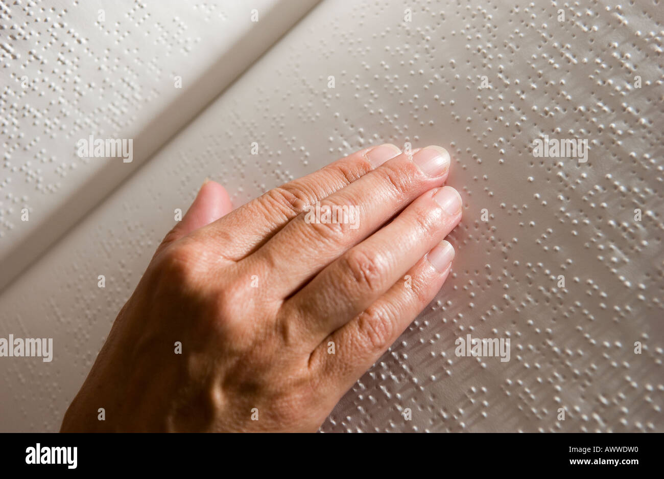 blind person reading braille Stock Photo - Alamy
