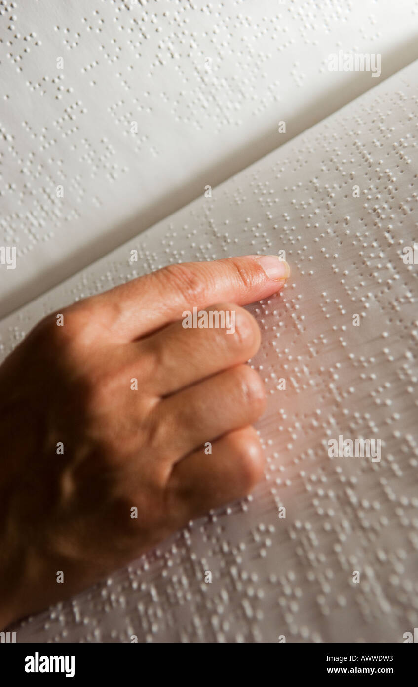 blind person reading braille Stock Photo - Alamy