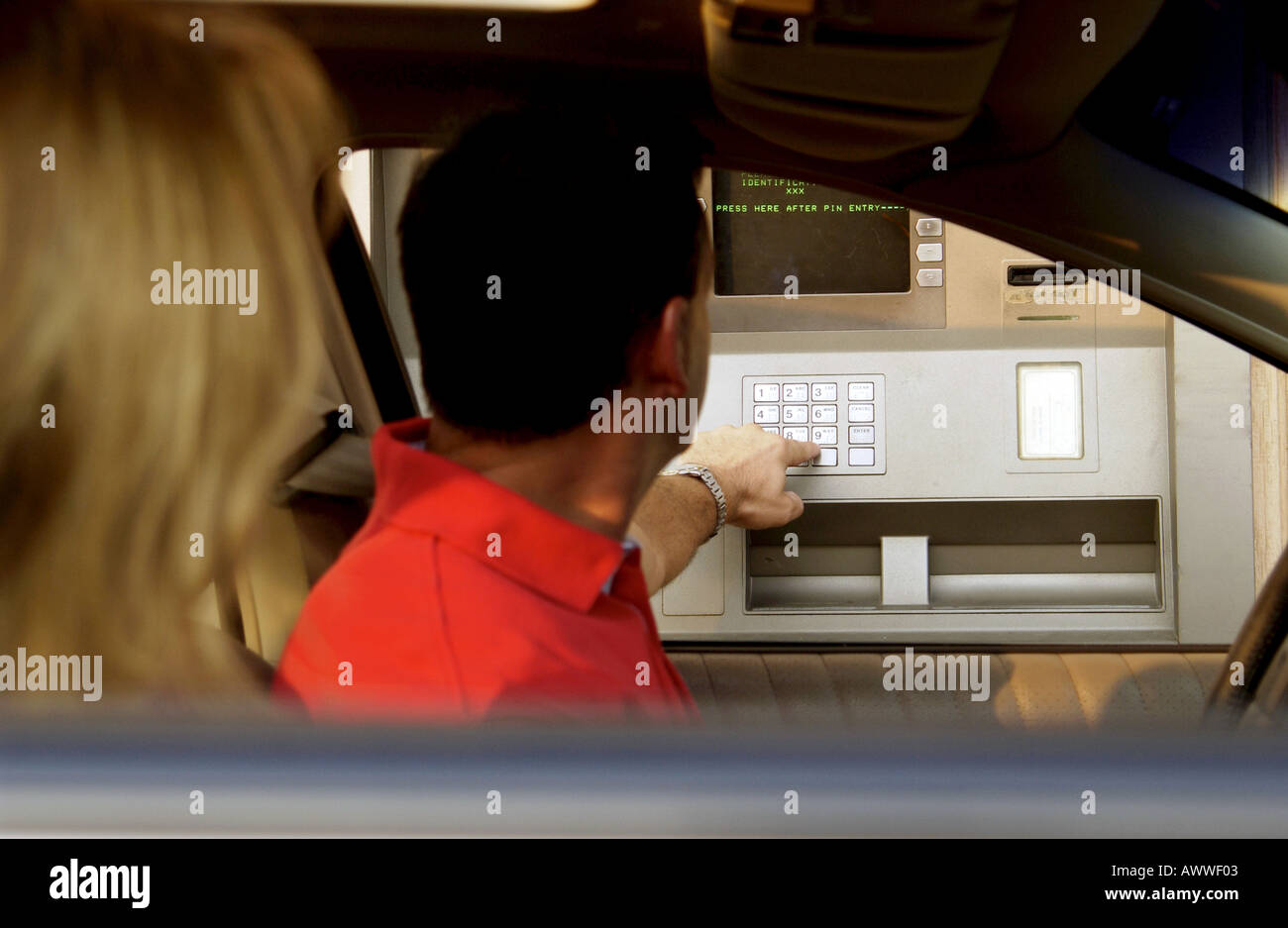 Man depositing money atm hi-res stock photography and images - Alamy