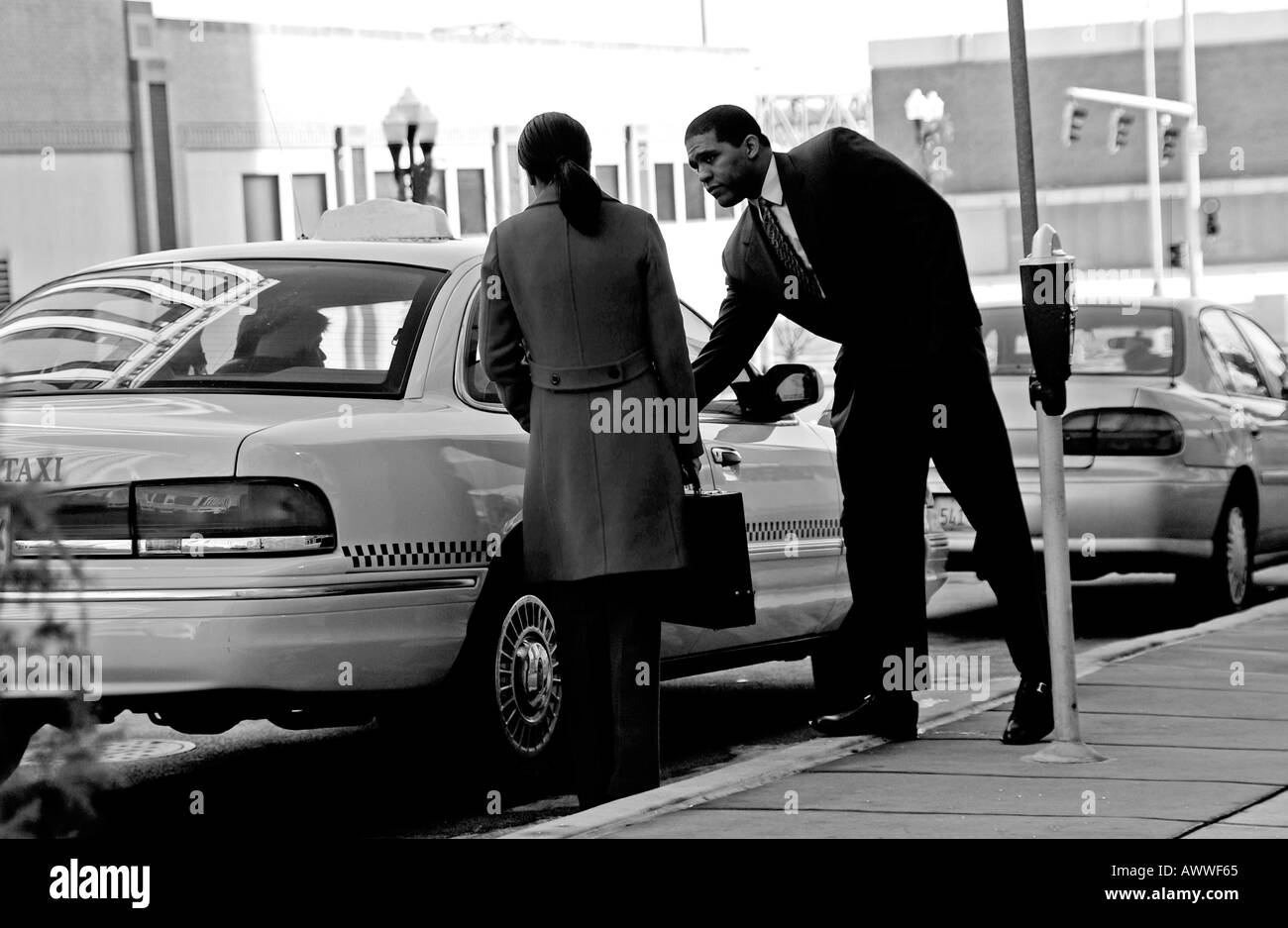 Man getting into black cab hi-res stock photography and images - Alamy