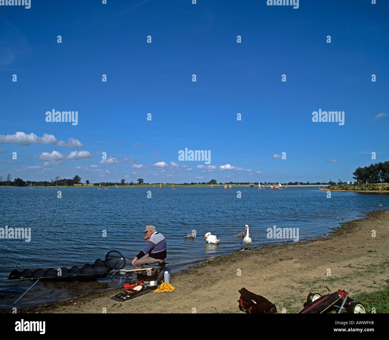 Fishing by the banks of the Alton Water Reservoir near Sutton on the ...