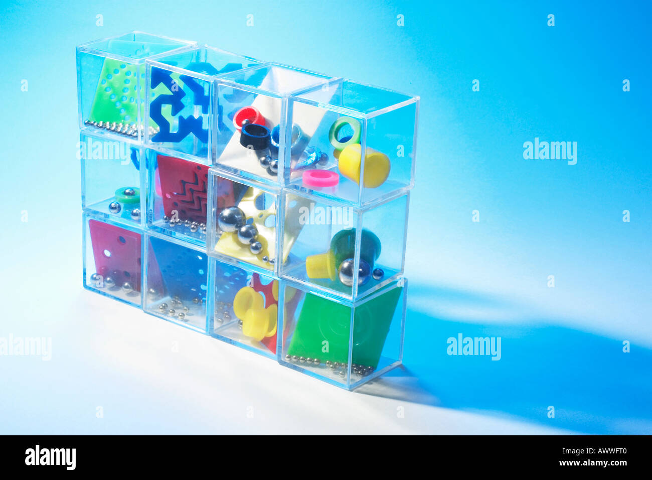 Puzzle Pieces in Plastic Boxes Stock Photo - Alamy
