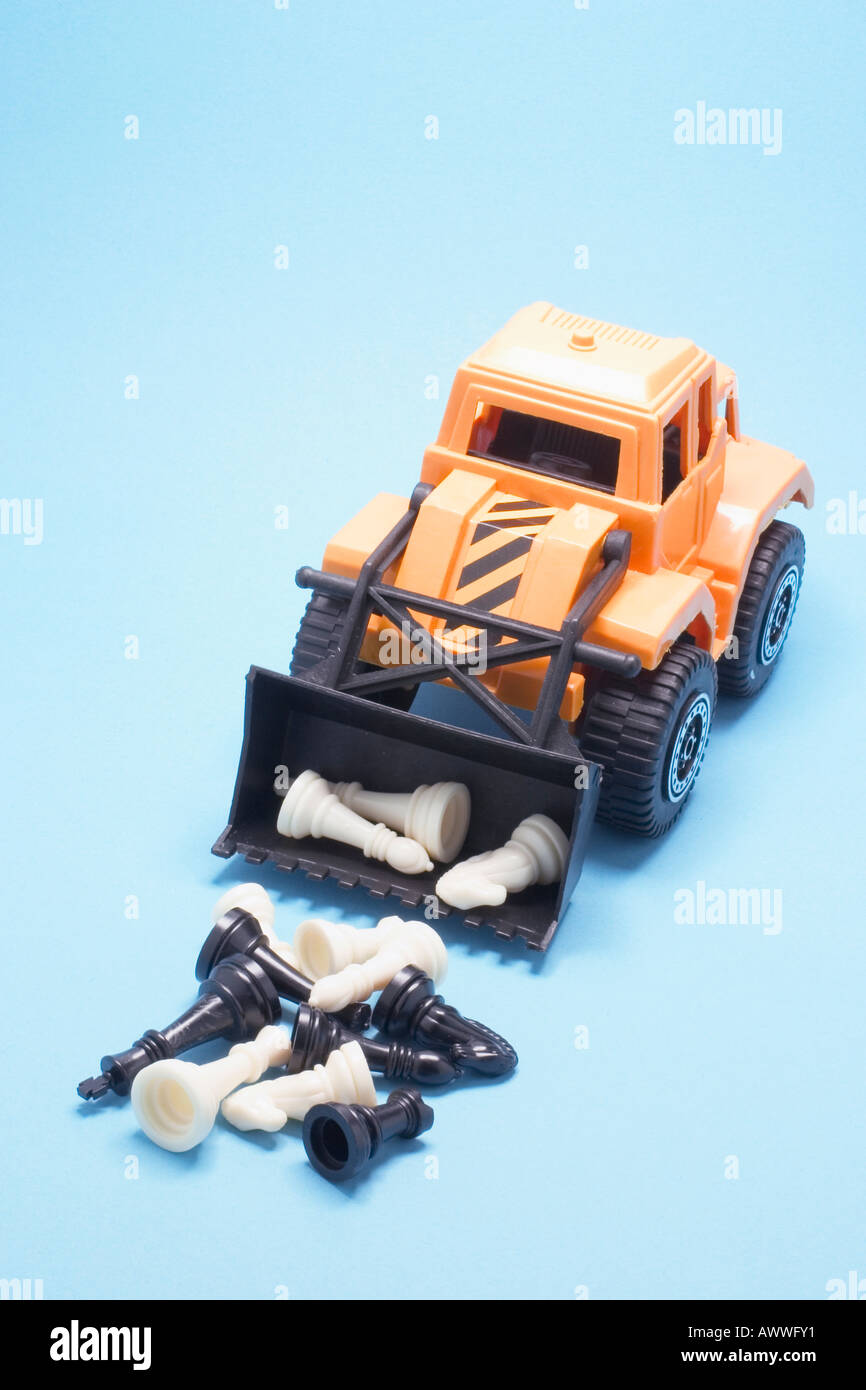 Toy Earth Mover with Chess Pieces Stock Photo - Alamy