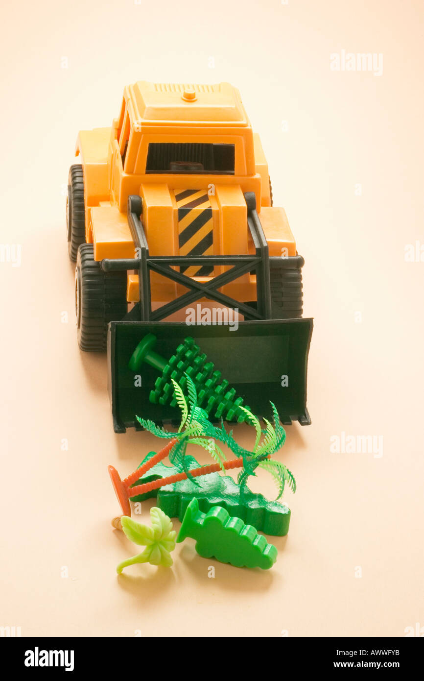 Toy Earth Mover with Miniature Trees Stock Photo - Alamy