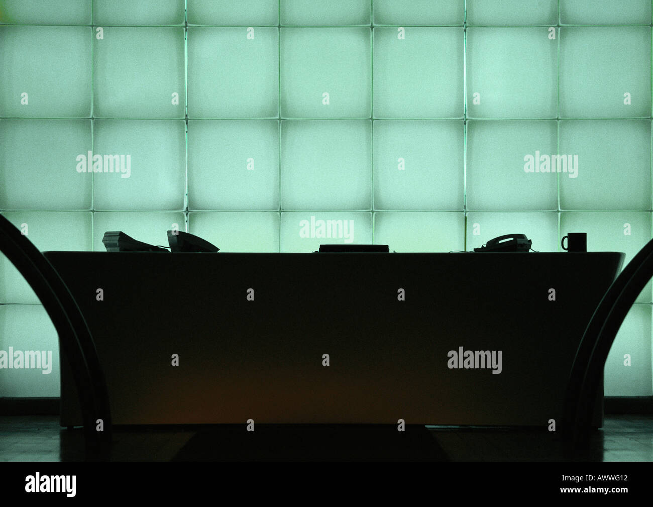 Desk in front of windows, silhouette Stock Photo - Alamy