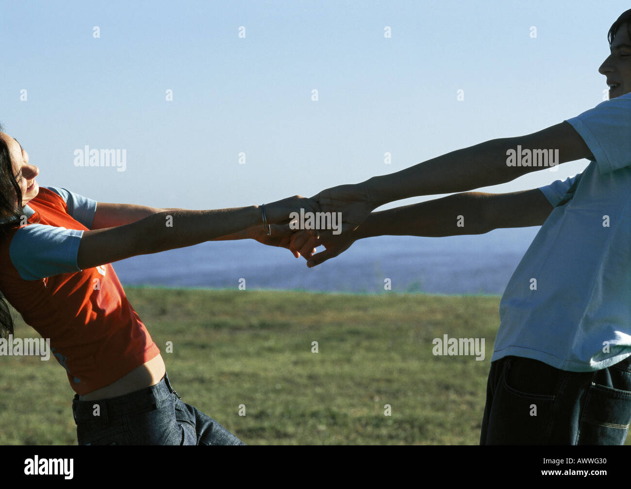 Arms around one another hi-res stock photography and images - Alamy