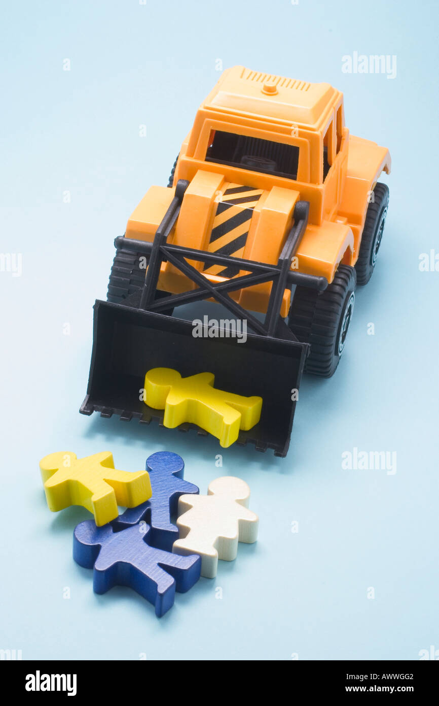 Toy Earth Mover with Wooden Children Figures Stock Photo - Alamy