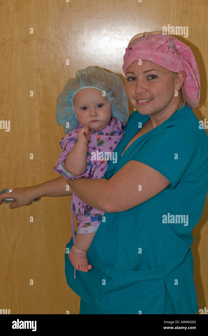 Nurse And Baby Patient Ready For Surgery Stock Photo - Alamy