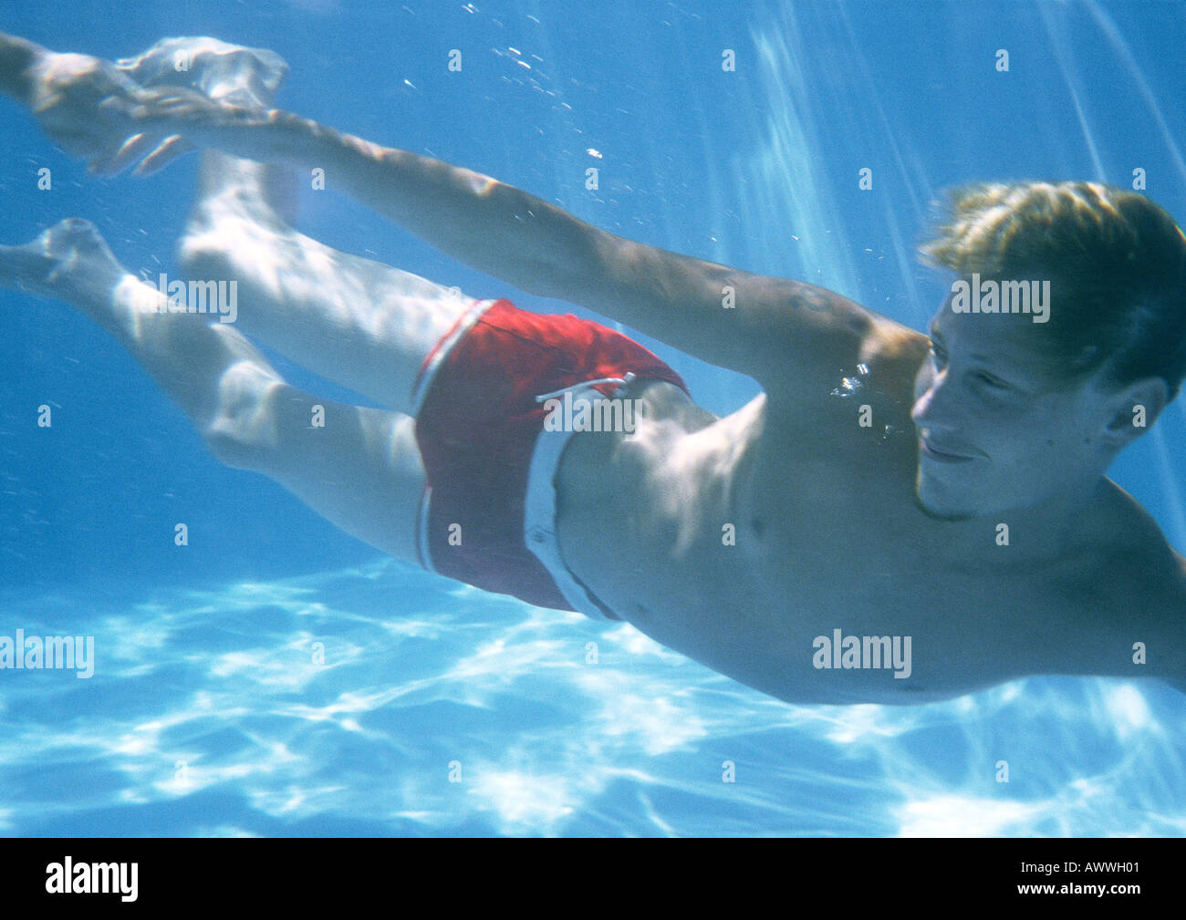 Full body of men with bathing suits hi-res stock photography and images ...