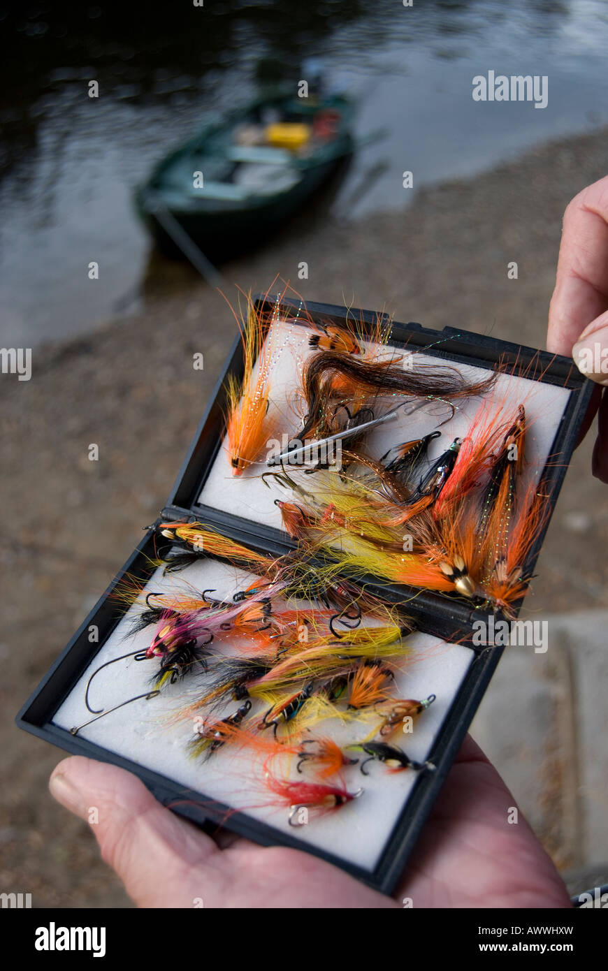 Atlantic Salmon flies held by Tay River Gillie (guide) Archie Steele ...