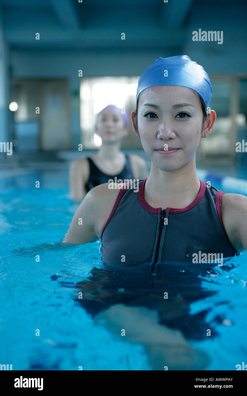 Two female swimmers in pool Stock Photo - Alamy