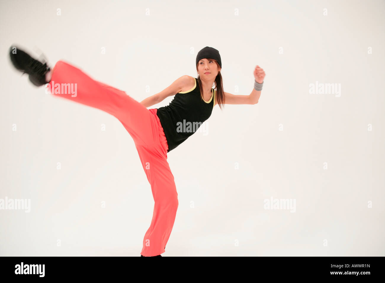Young woman in fighting stance Stock Photo - Alamy