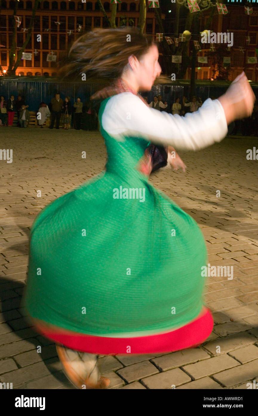 Woman in Basque traditional folk costume dances in Arenal, Bilbao ...