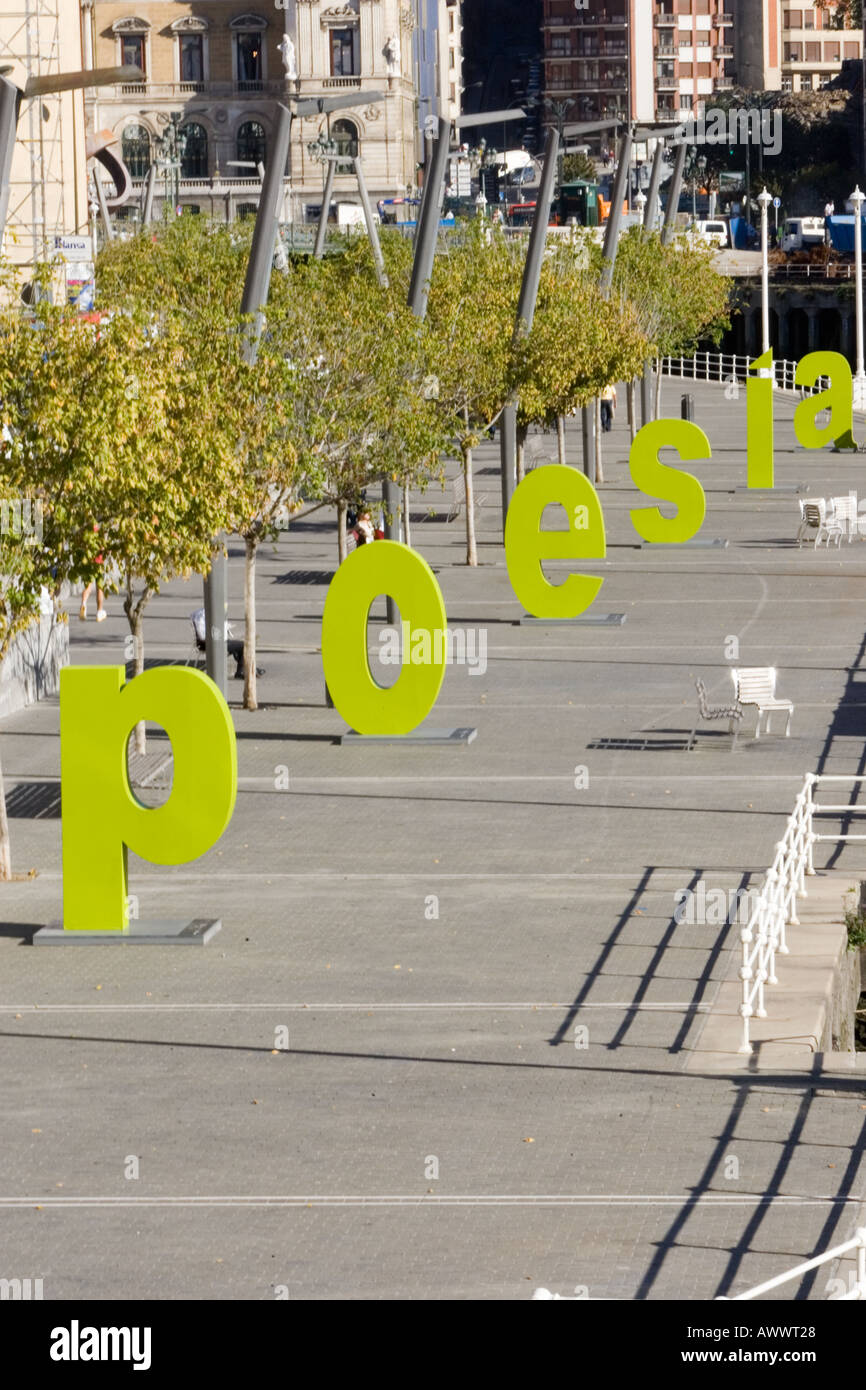 The Spanish word for poetry "poesia" is spelt out in large lime green ...