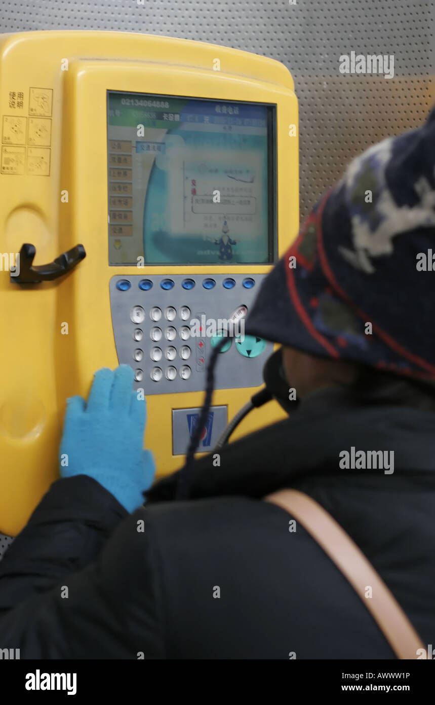 Using a payphone hi-res stock photography and images - Alamy