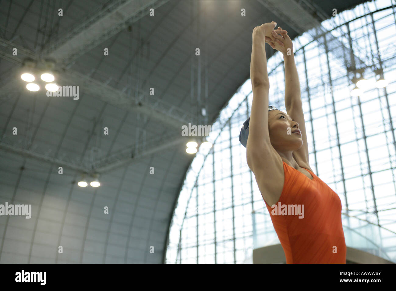 Female swimmer stretching hi-res stock photography and images - Alamy