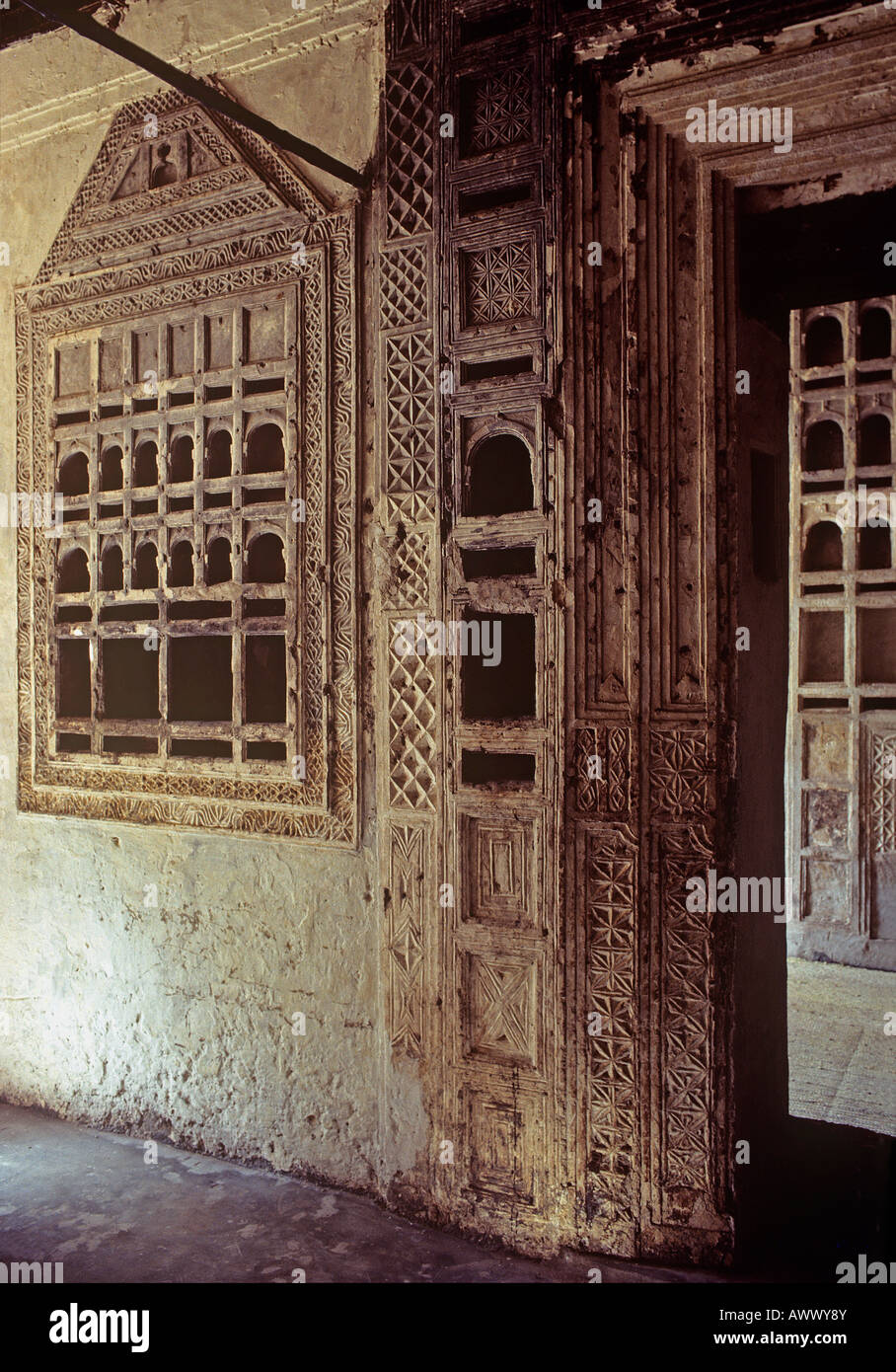 intricate plasterwork on an old house on the Island of Lamu off the ...