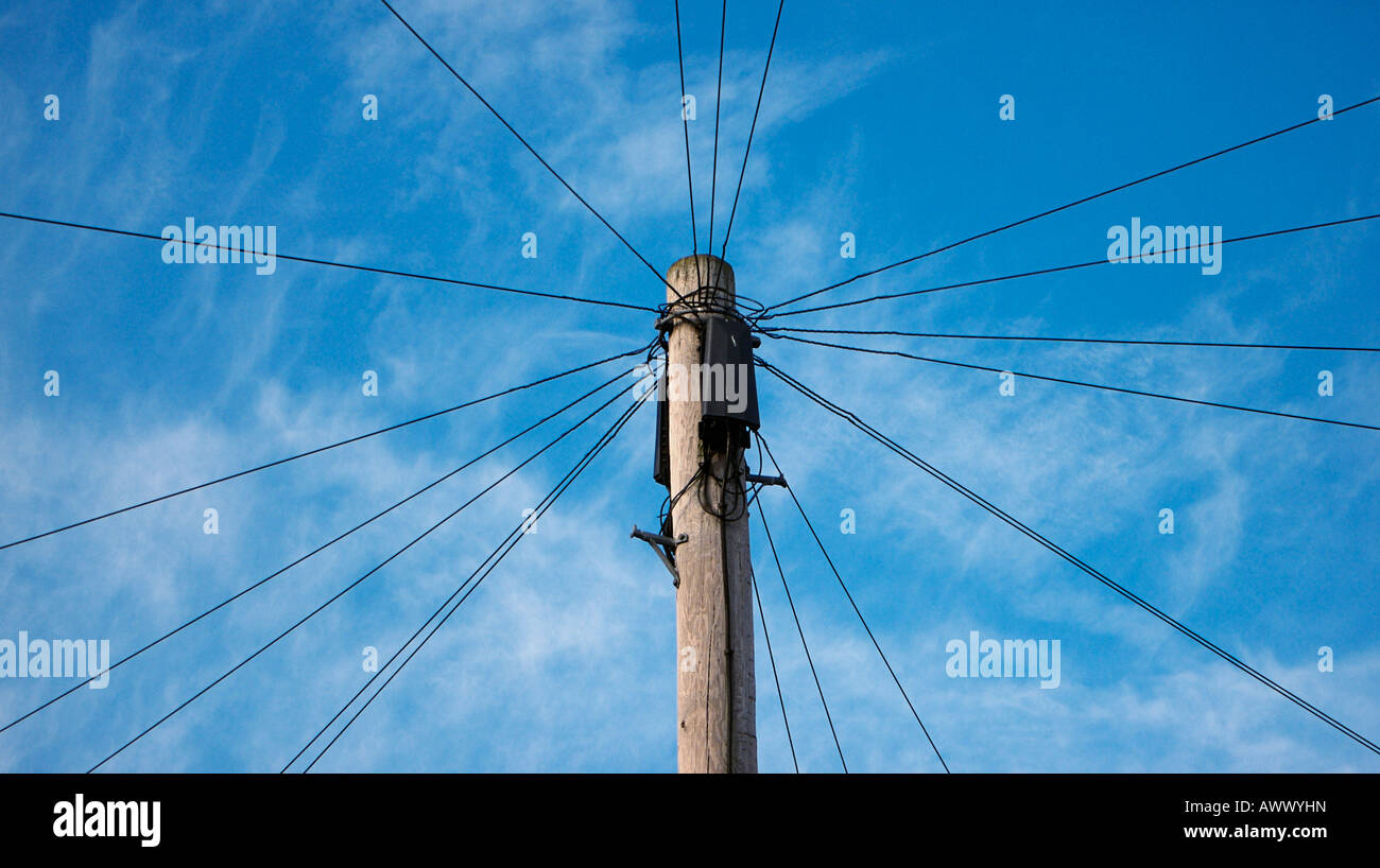 Telegraph wires emanating from a telegraph pole Stock Photo - Alamy