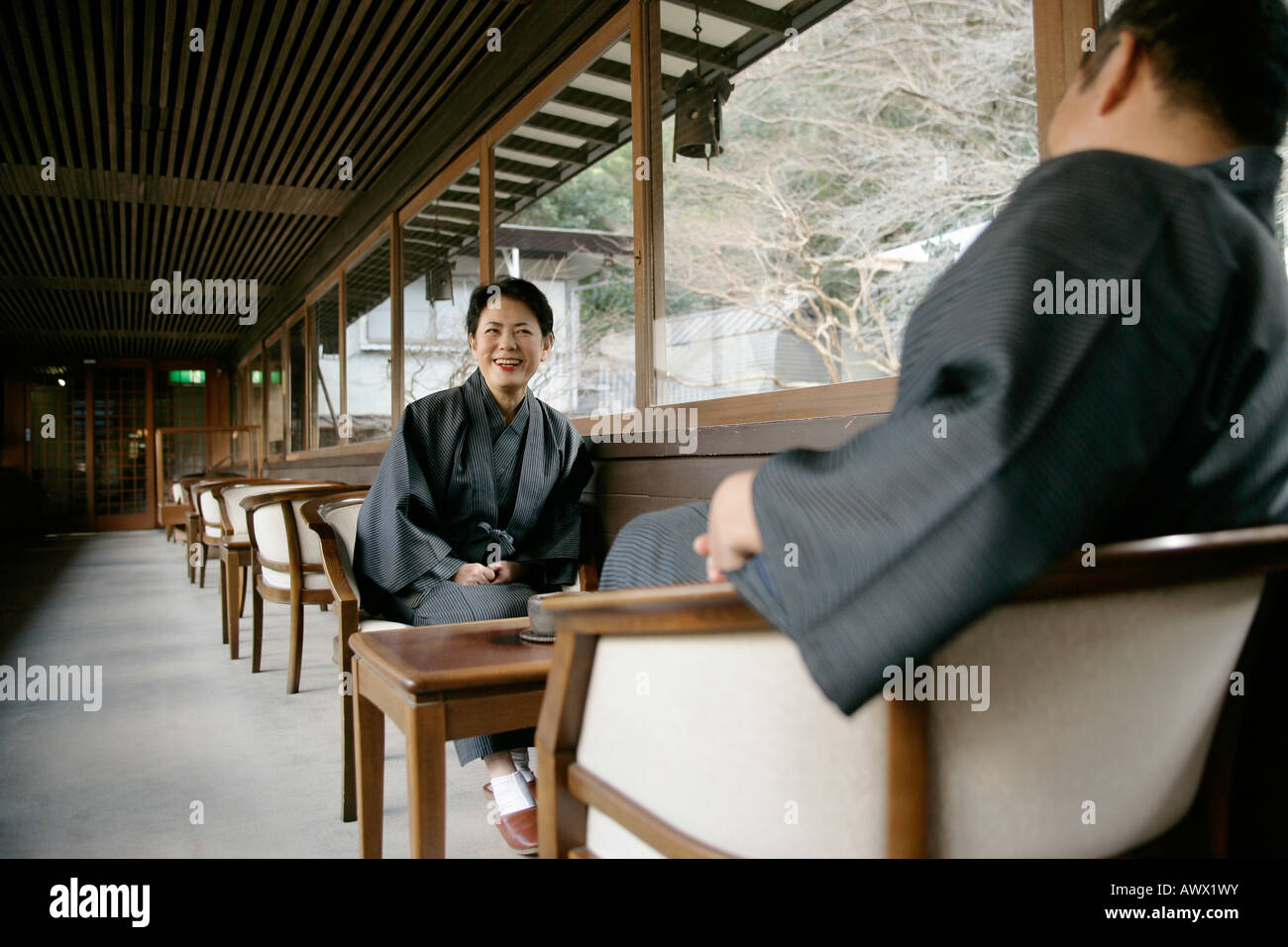 Man sitting table wearing hi-res stock photography and images - Alamy