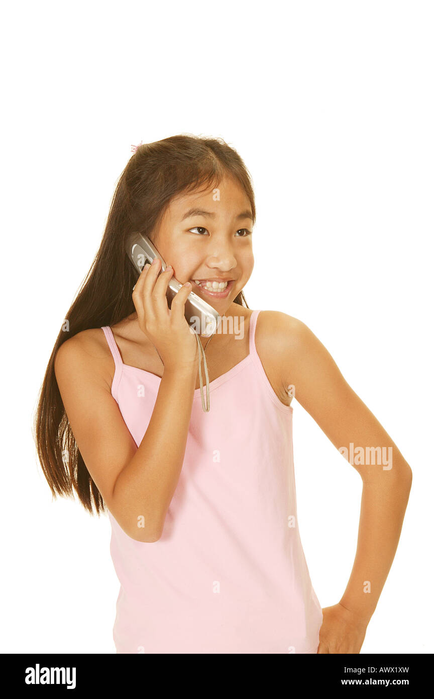 Tween girl on cell phone hi-res stock photography and images - Alamy