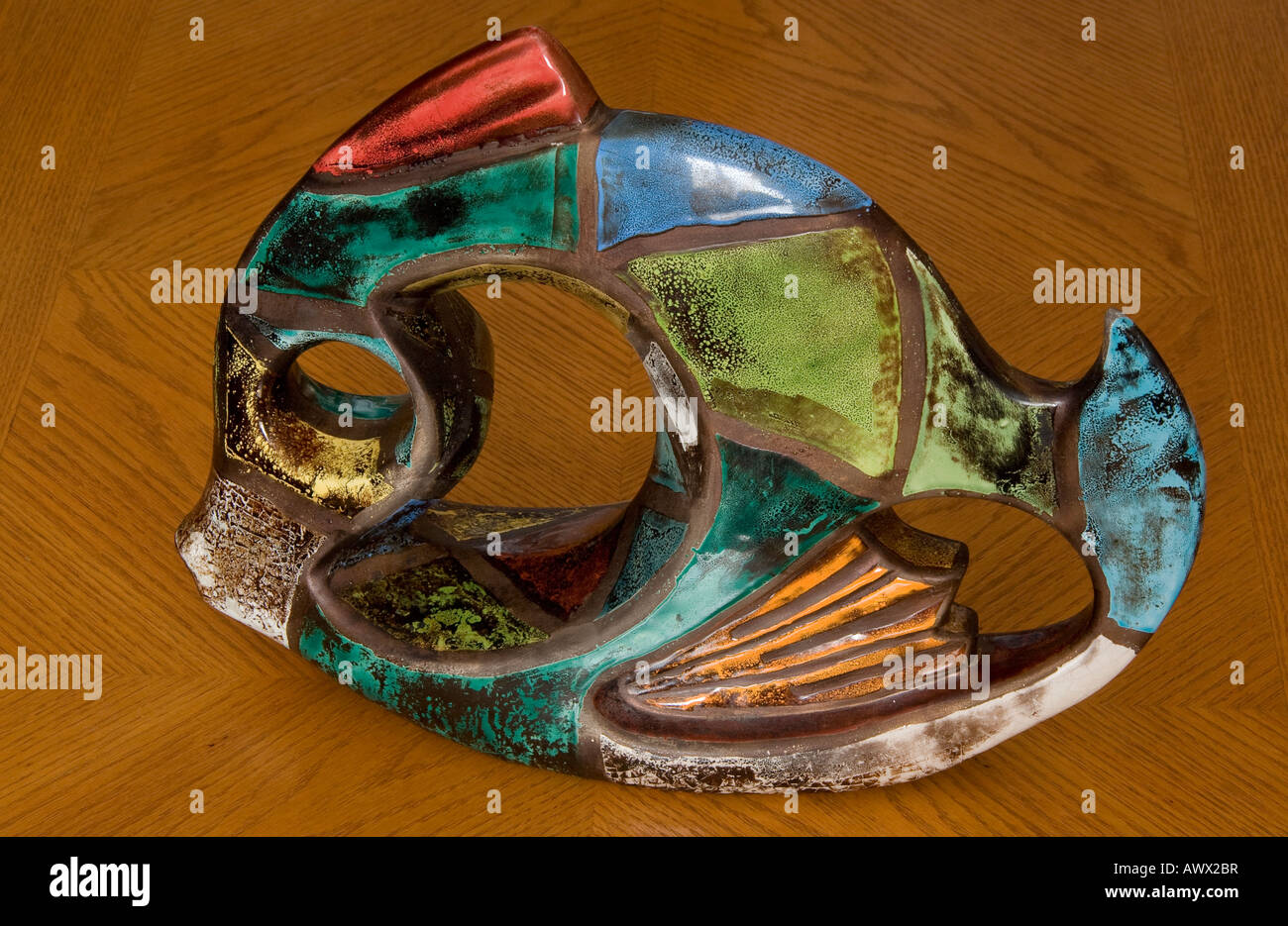Hand painted ceramic, raku fish Stock Photo - Alamy