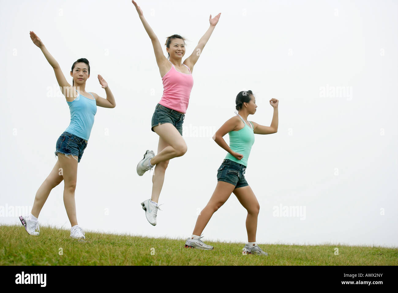 young women do Aerobics on lawn Stock Photo - Alamy