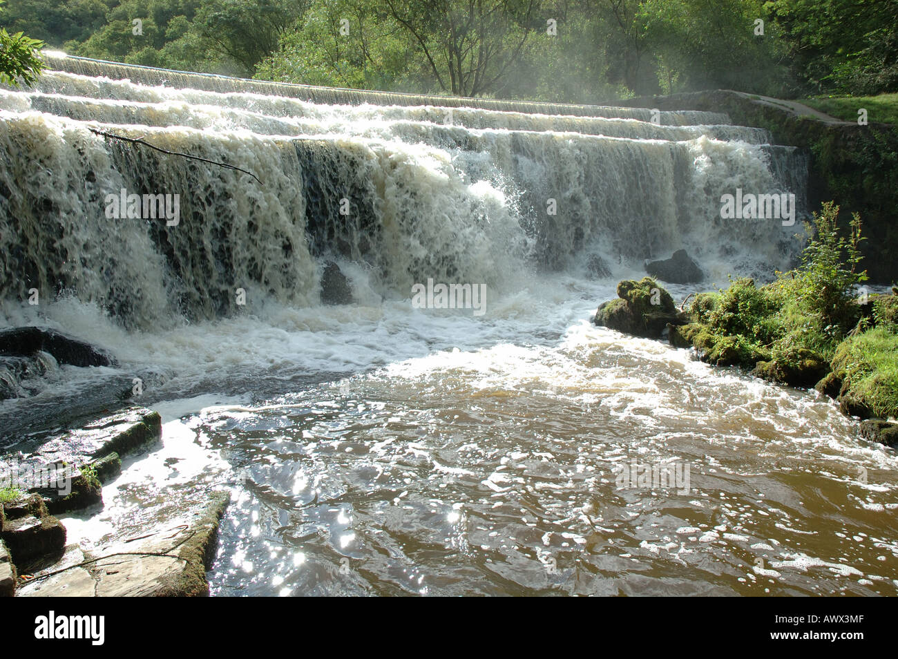 River Wye cascading over a weir in Monsal Dale, Derbyshire Stock Photo ...