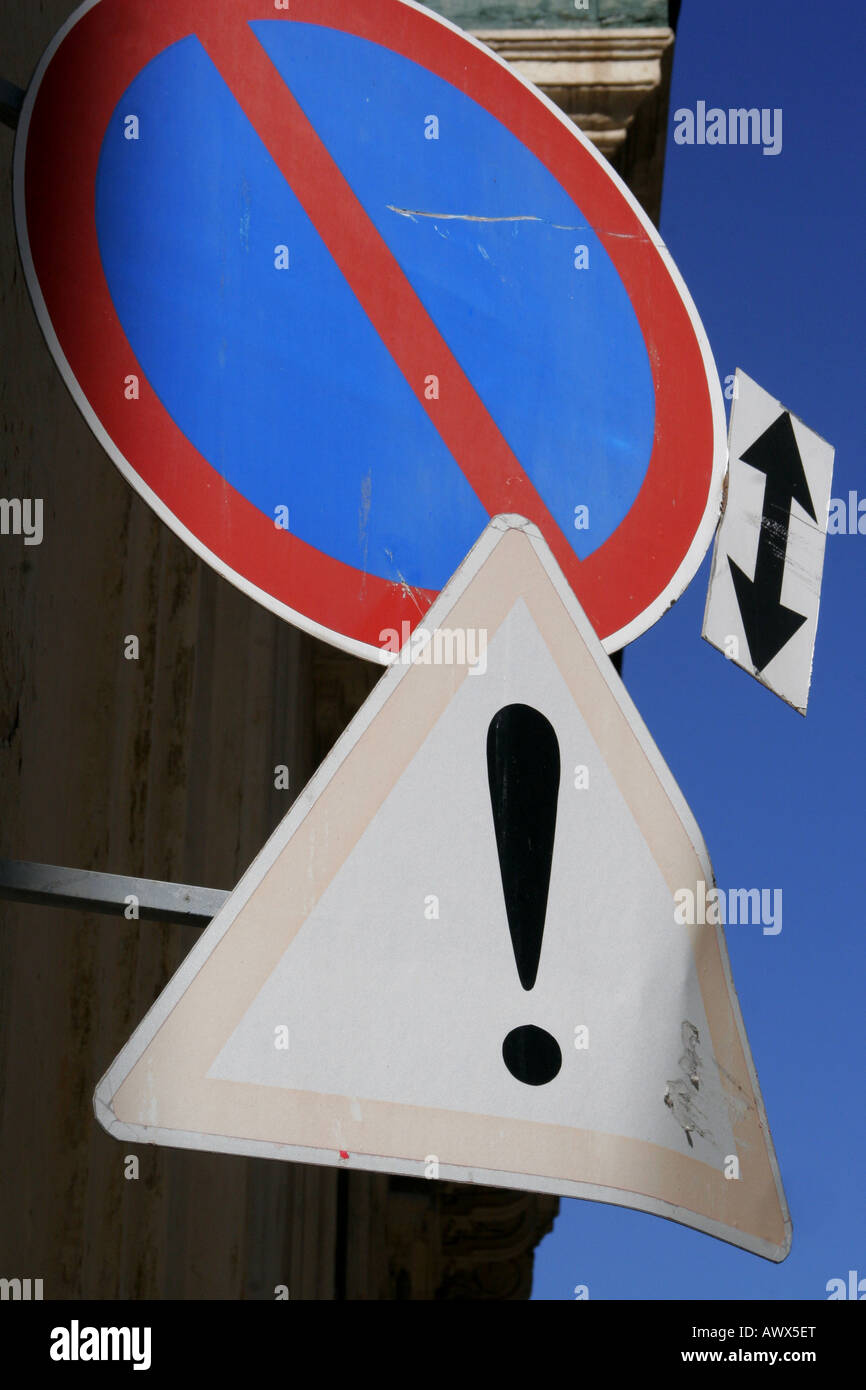 Brightly coloured road signs aganst a blue sky Stock Photo - Alamy