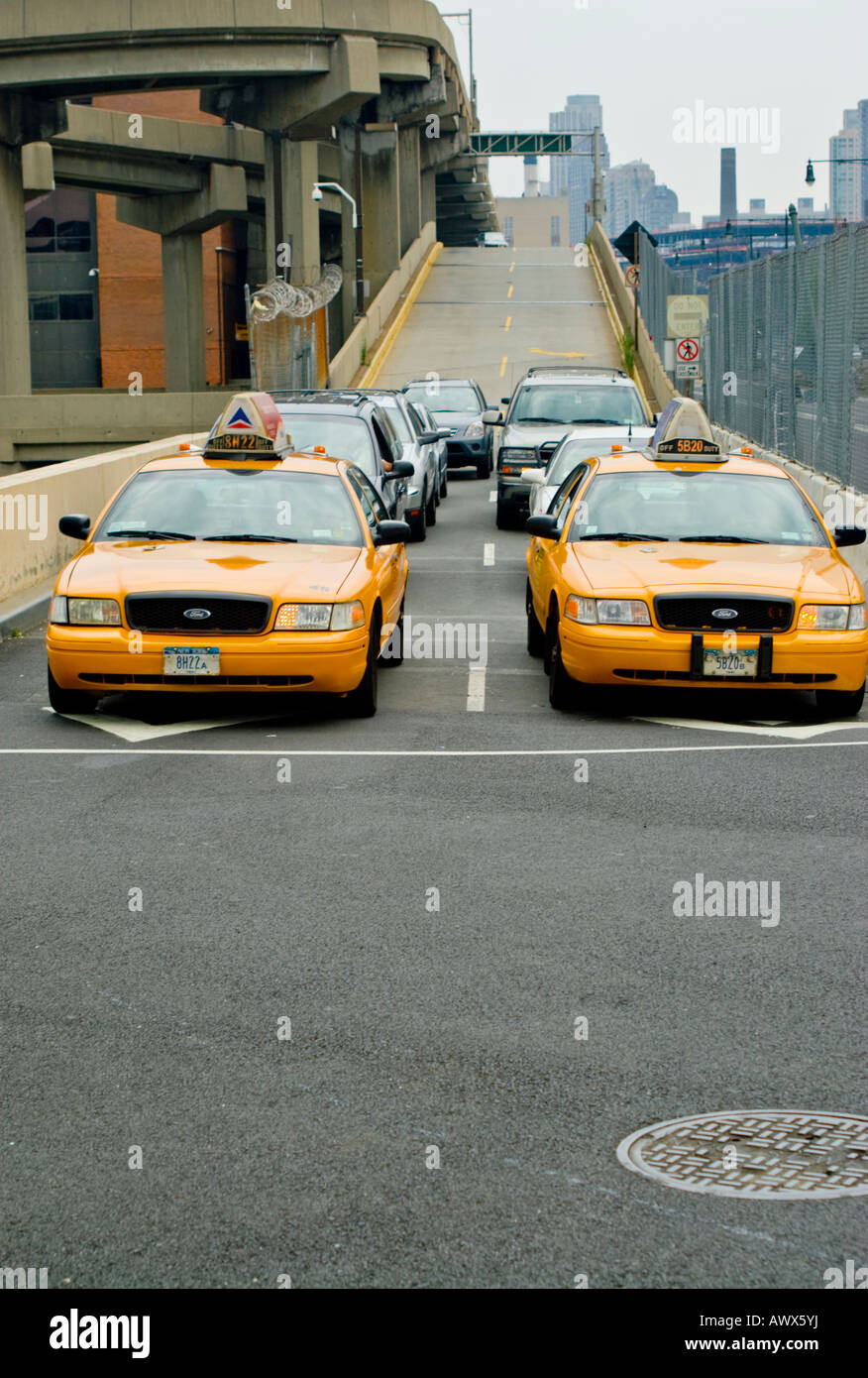 Yellow taxi cabs on a street of New York city, USA Stock Photo - Alamy