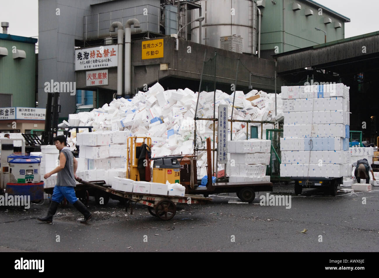 Polystyrene fish cartons in a heap at Tsukiji Central Wholesale Market ...