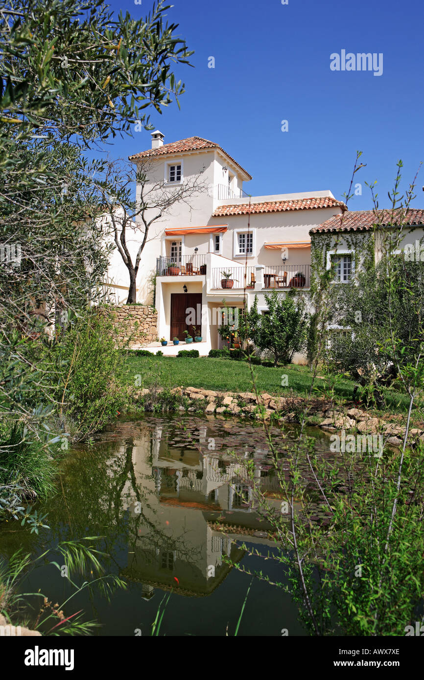 Large rustic hotel and pond set in beautiful gardens in the Spanish ...
