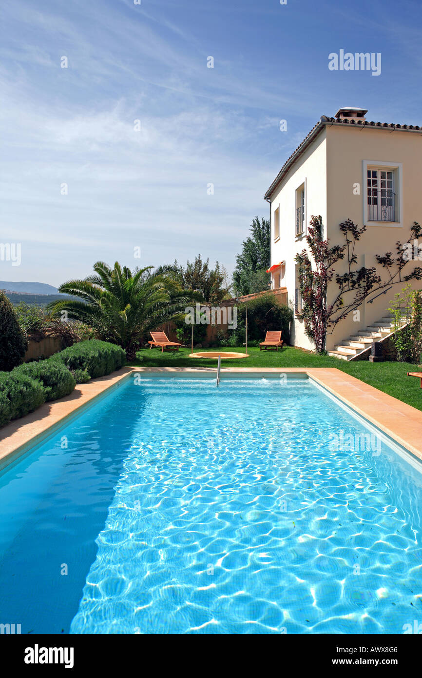 Large rustic hotel and swimming pool set in beautiful gardens in the ...