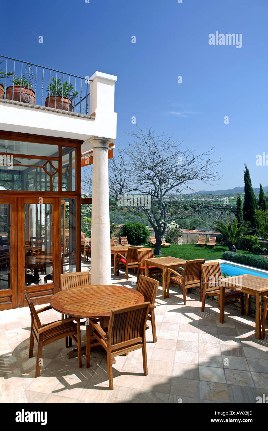 Large rustic hotel and swimming pool set in beautiful gardens in the ...