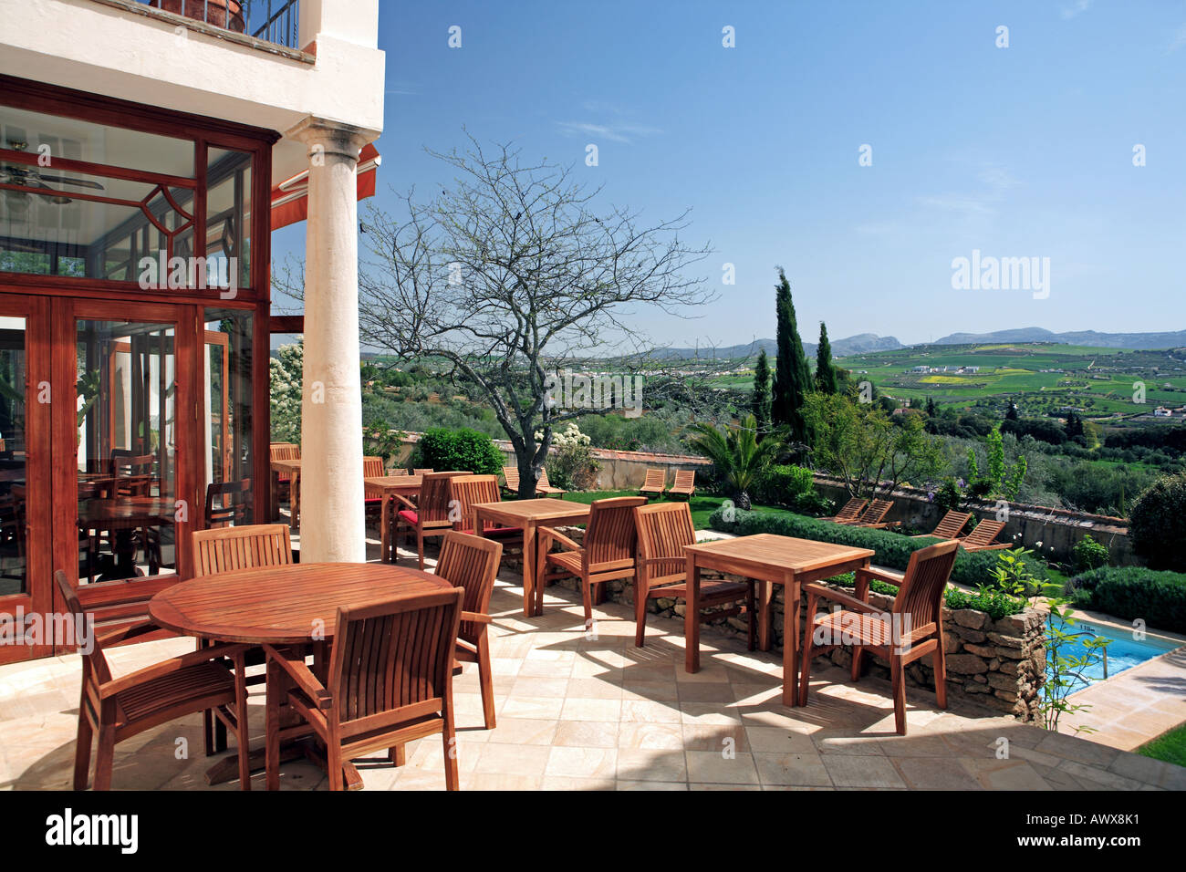 Large rustic hotel and swimming pool set in beautiful gardens in the ...