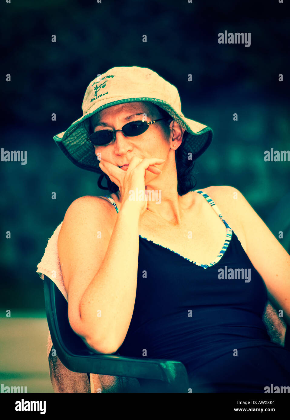 woman in bathing suit & hat Stock Photo - Alamy