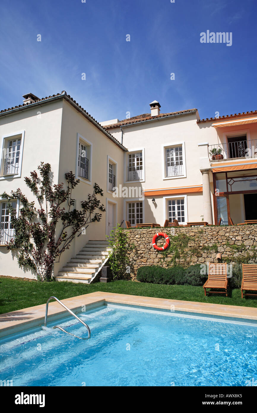 Large rustic hotel and swimming pool set in beautiful gardens in the ...