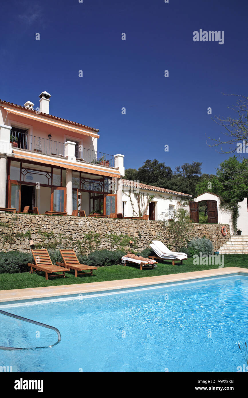 Large rustic hotel and swimming pool set in beautiful gardens in the ...