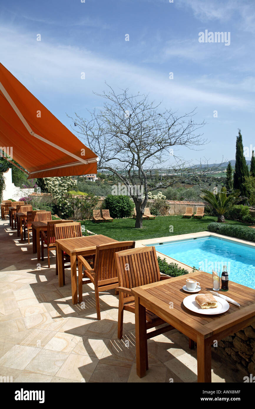 Large rustic hotel and swimming pool set in beautiful gardens in the ...