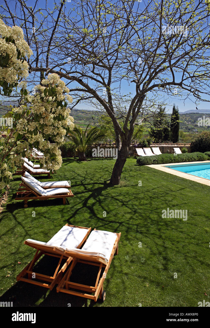 Large rustic hotel and swimming pool set in beautiful gardens in the ...