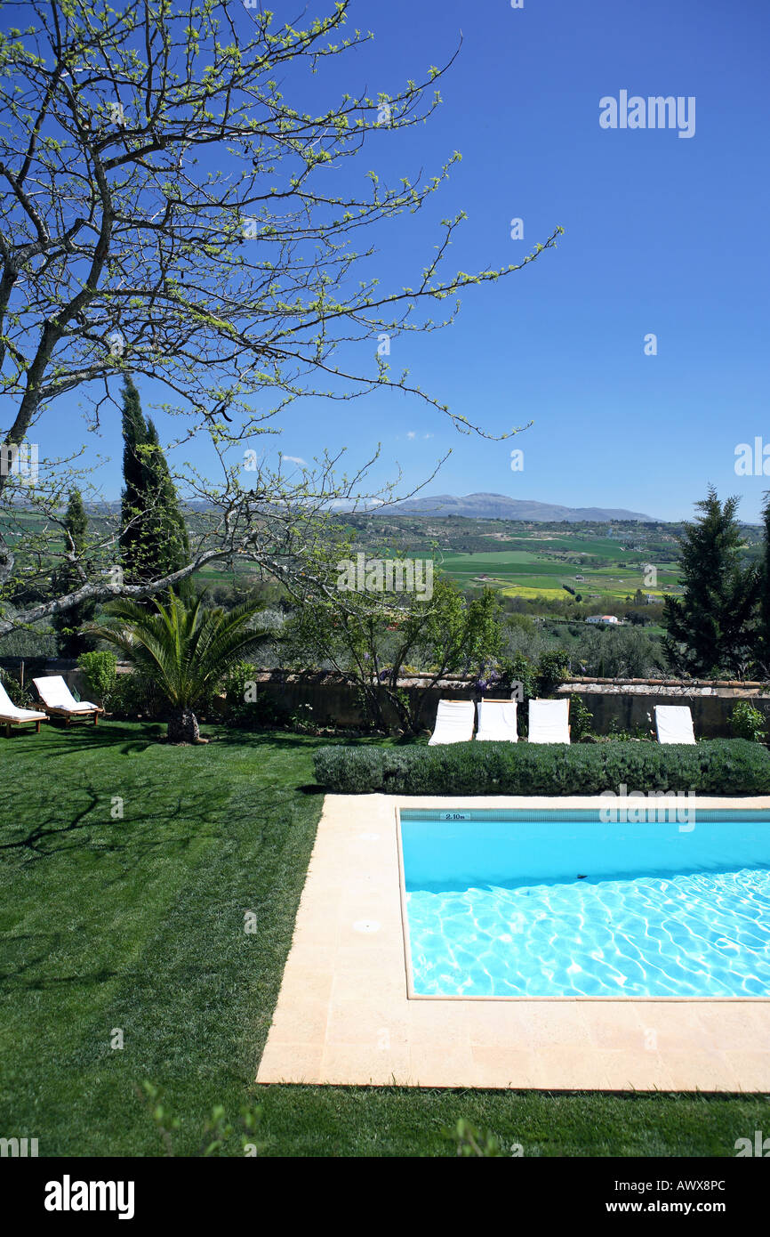 Large rustic hotel and swimming pool set in beautiful gardens in the ...