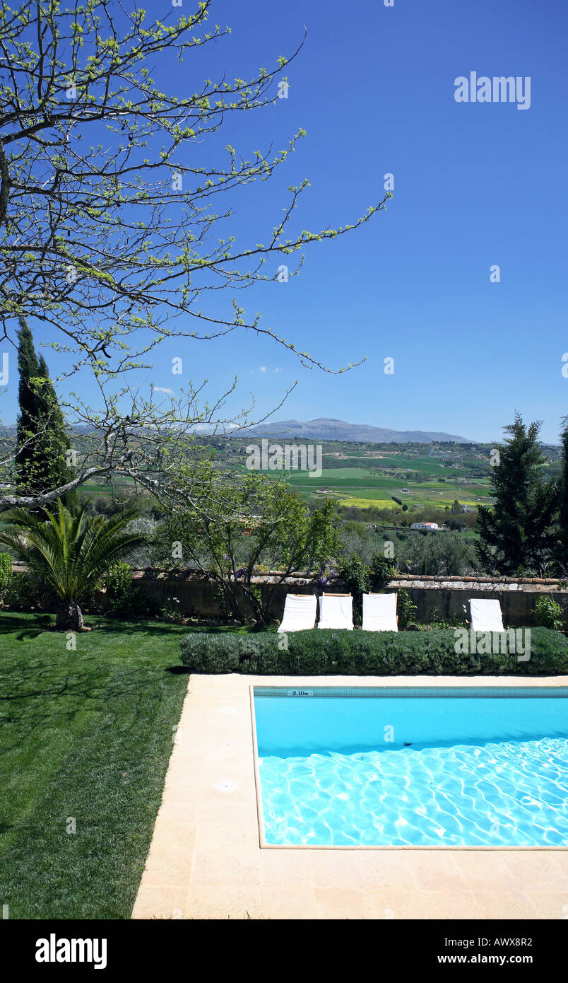 Large rustic hotel and swimming pool set in beautiful gardens in the ...