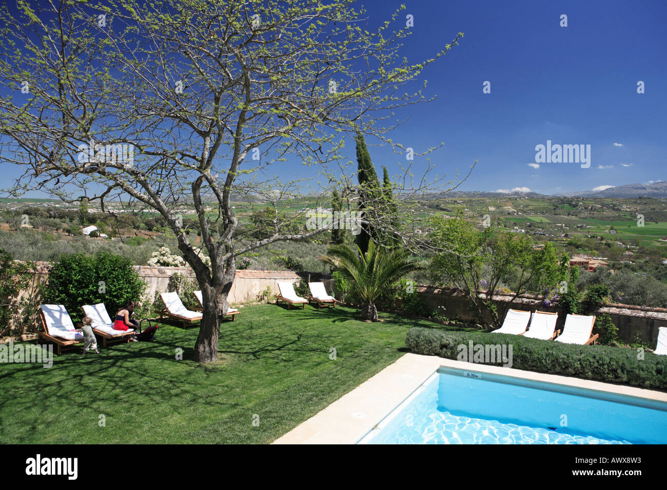 Large rustic hotel and swimming pool set in beautiful gardens in the ...