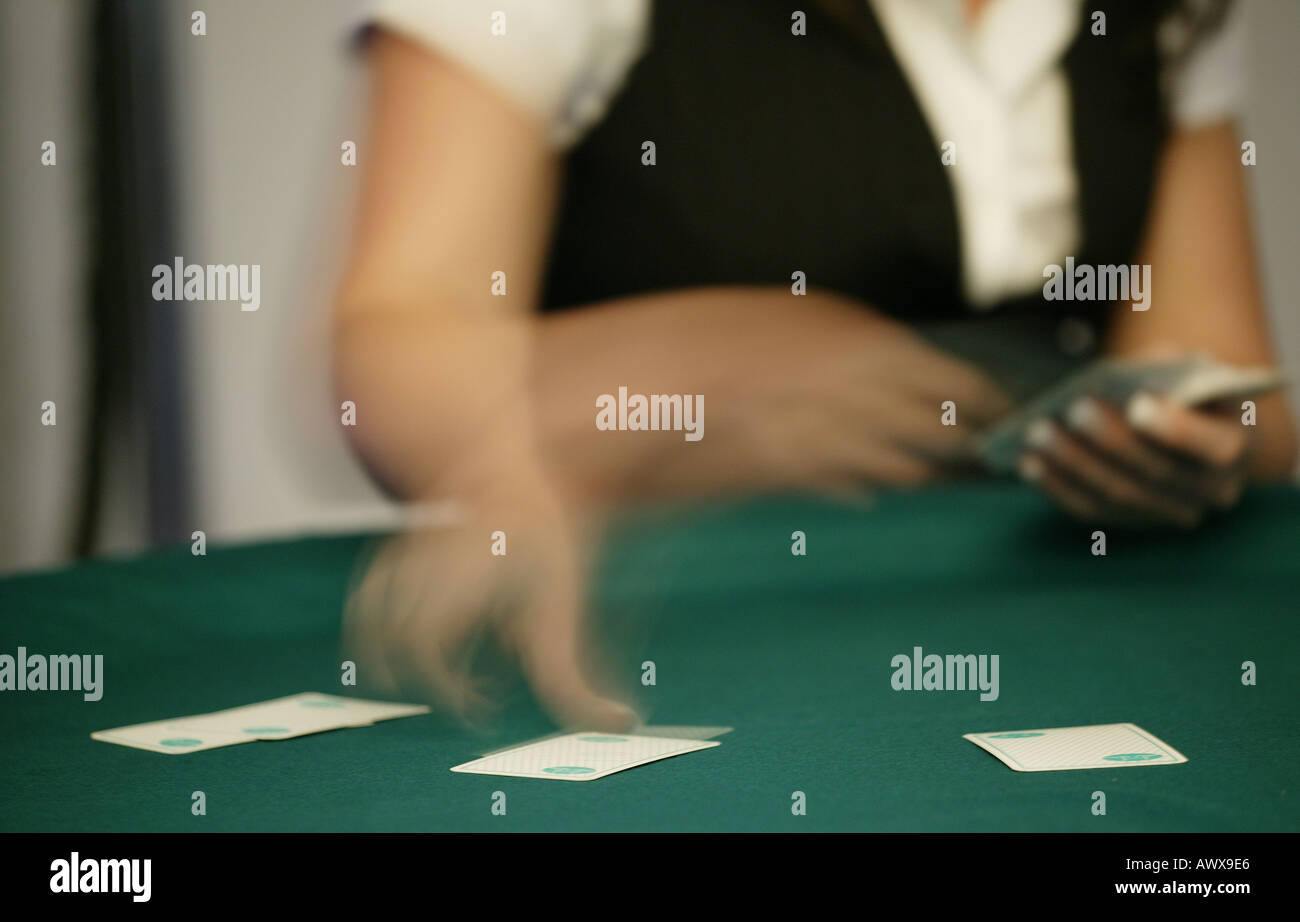 Dealing cards in motion Stock Photo - Alamy